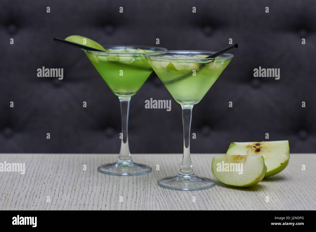 Two glasses of apple martini Stock Photo - Alamy