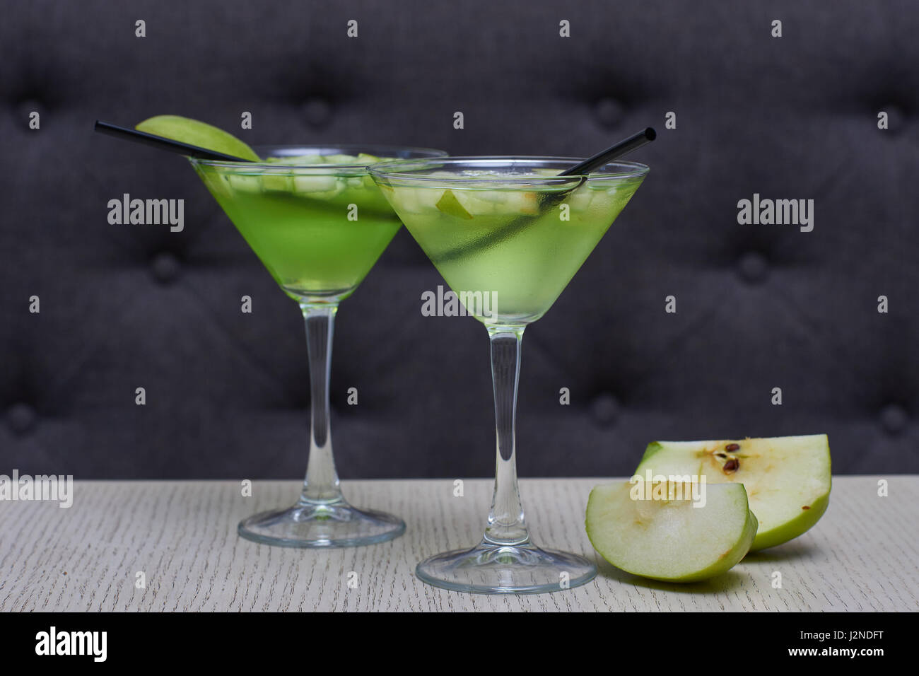 Two glasses of apple martini Stock Photo - Alamy