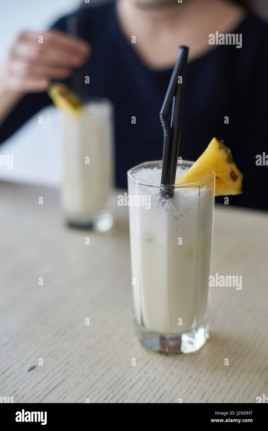 Two glasses of pina colada Stock Photo - Alamy