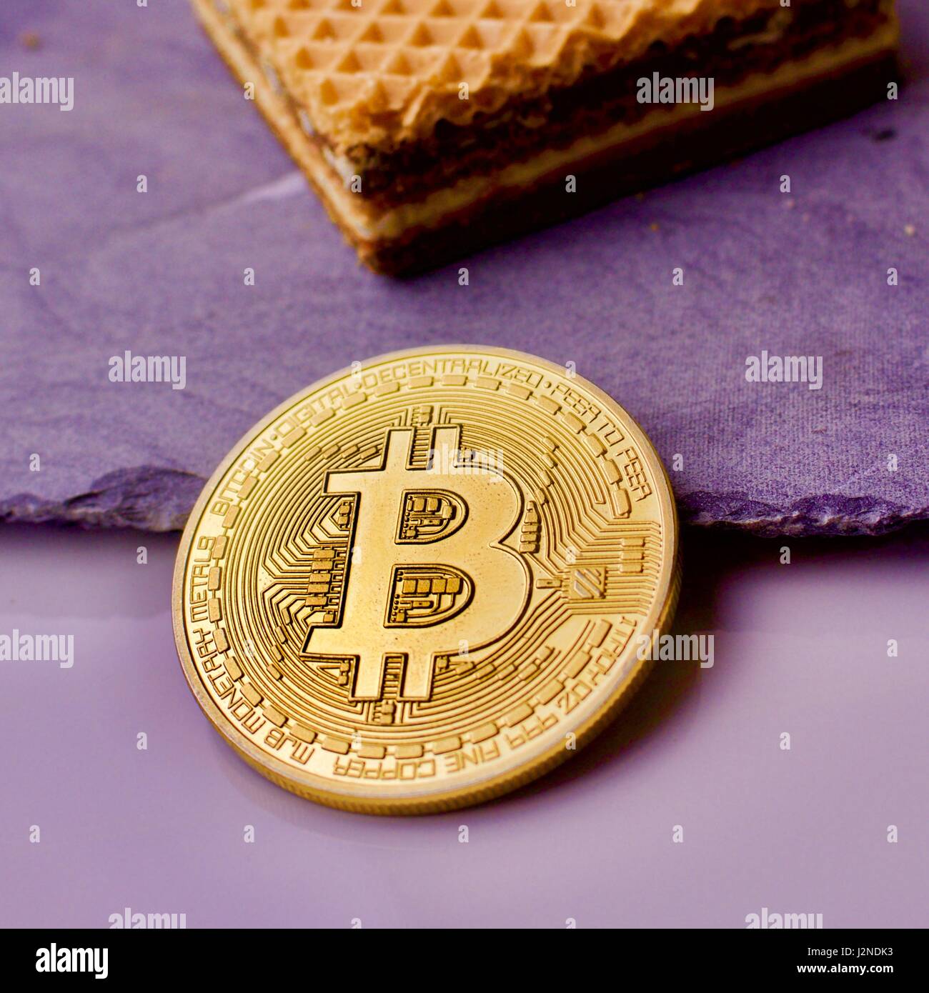 Bitcoin physical coin with a chocolate Stock Photo - Alamy