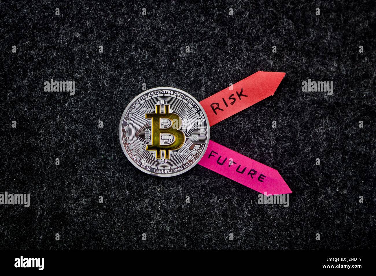 Cryptocurrency physical silver bitcoin coin with two colorful arrows ...