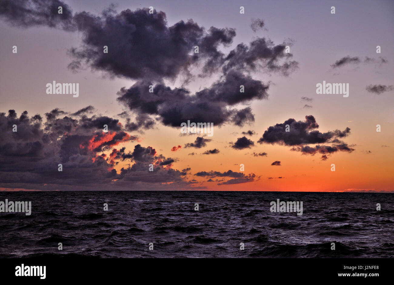 Abstract landscape of sunset over the sea Stock Photo - Alamy