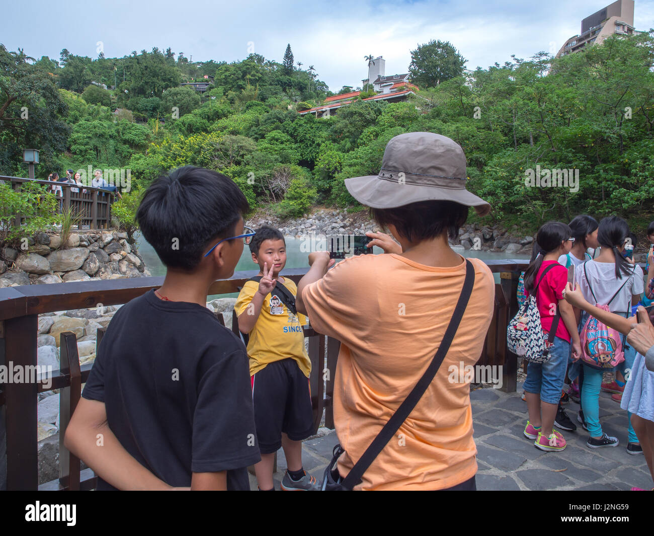 Xinbeitou, Taiwan - October 06, 2016: Taiwanese family take a picture ...