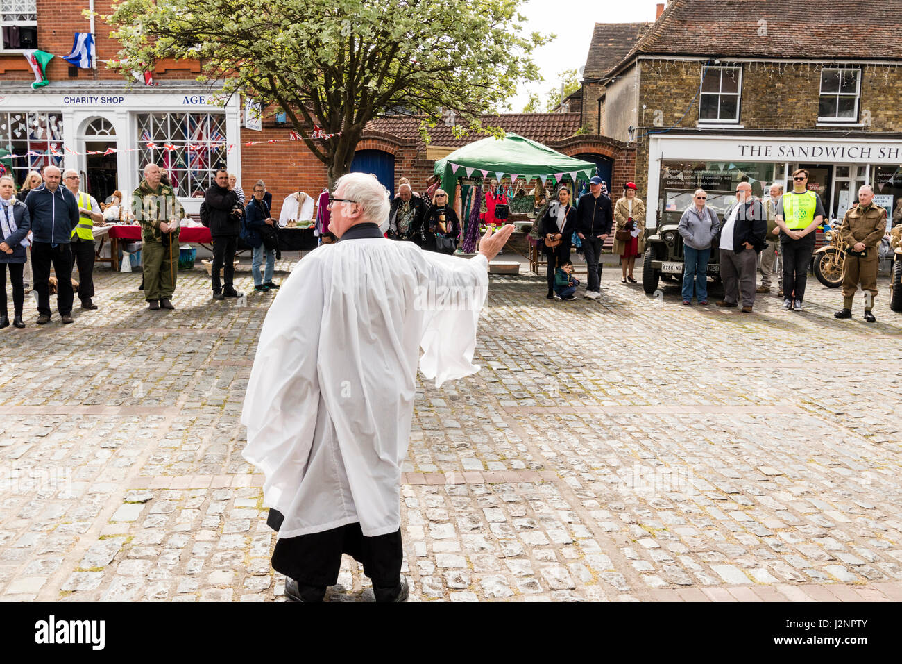 England, Sandwich. Church of England Vicar, Priest conducting the open ...