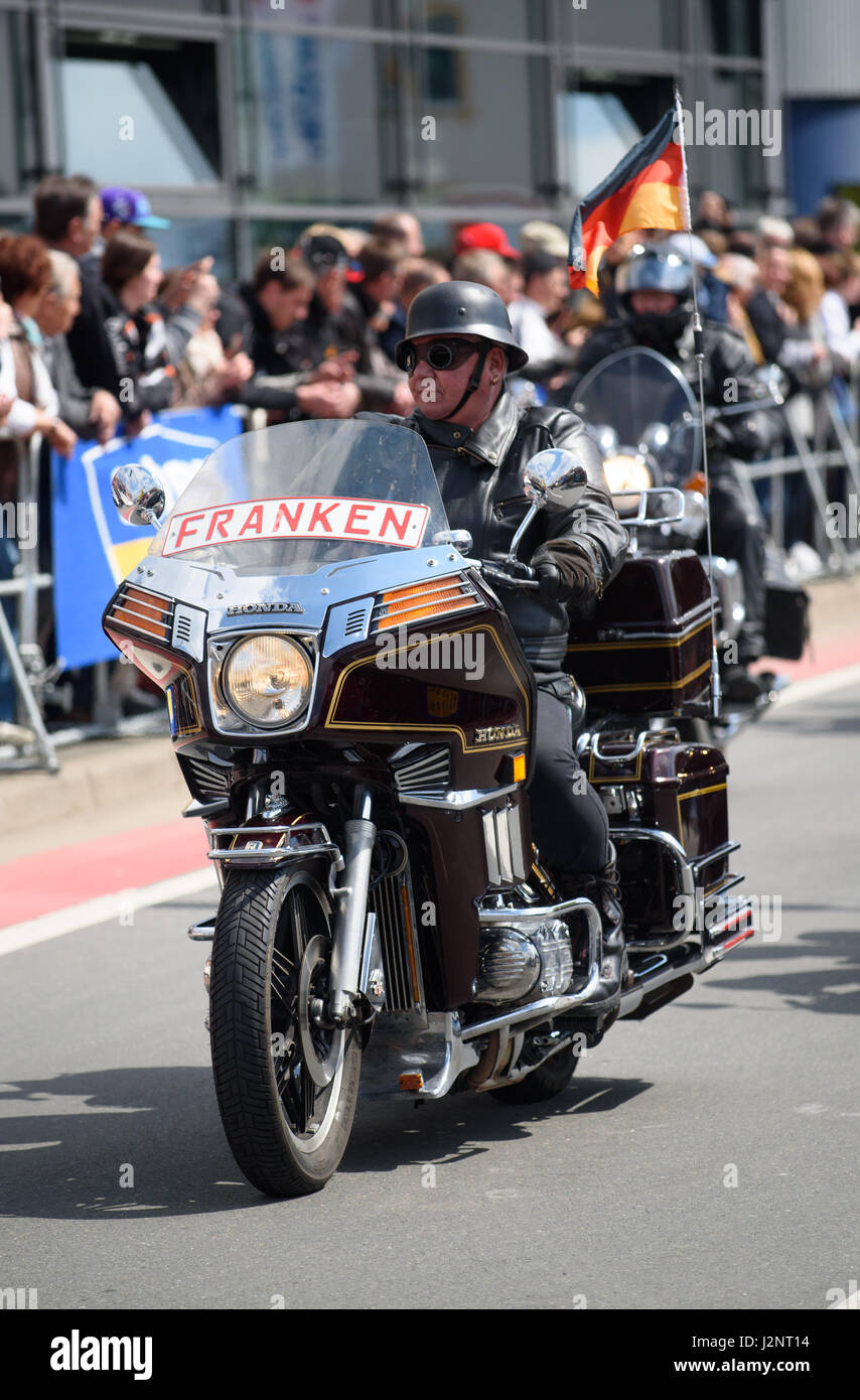 Kulmbach, Germany. 20th Apr, 2017. A motor bike driver with 'Franken ...