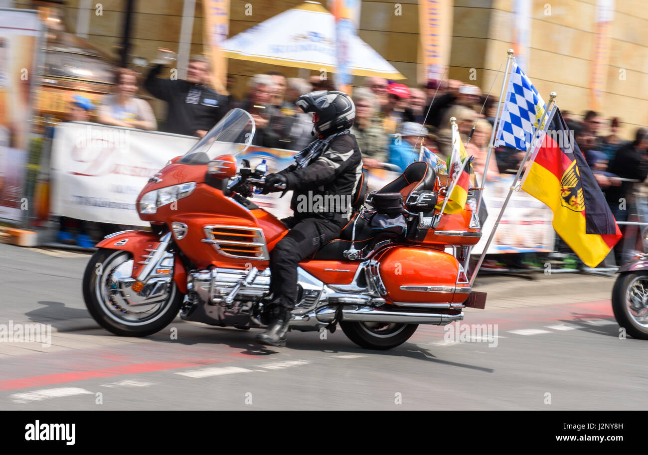 dpatop - A motorcyclist has attached a German and a Bavarian flag to ...