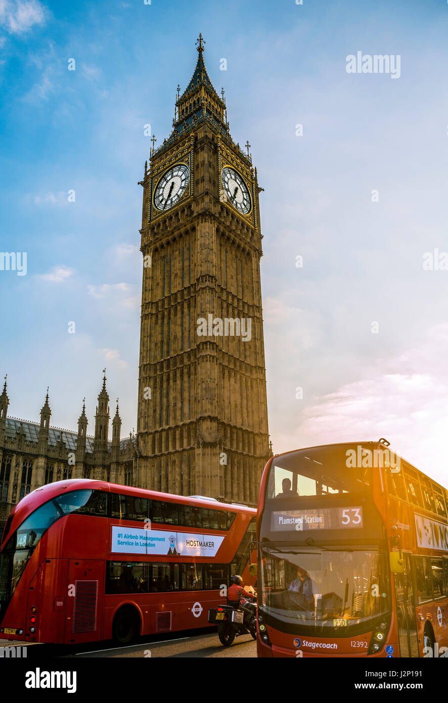 Red double decker bus in front of Big Ben, Houses of Parliament ...