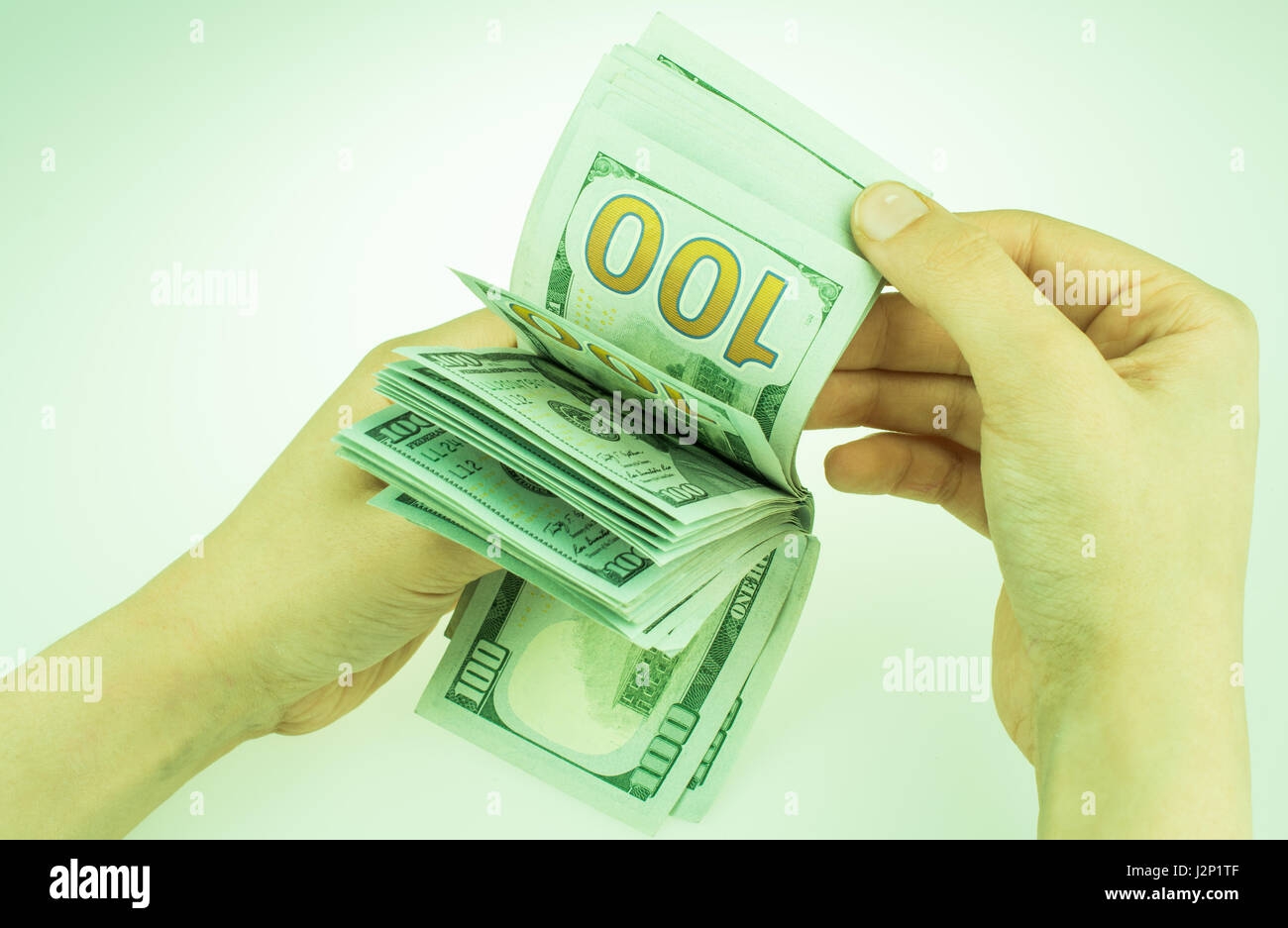 Human hand holding American dollar bill as money isolated on white ...