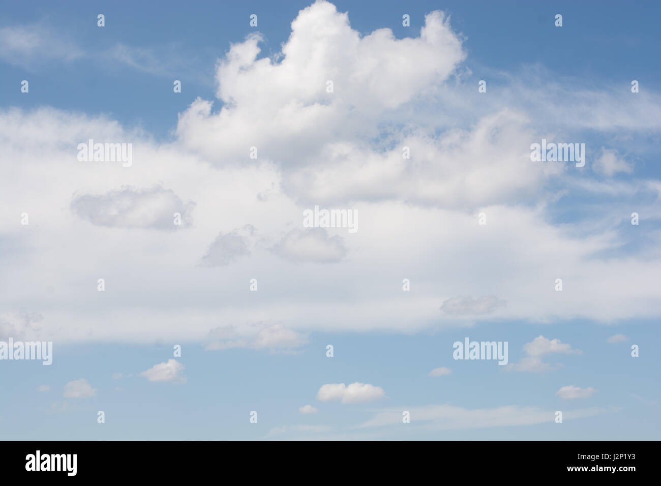 Blue cloudy sky with white clouds Stock Photo - Alamy