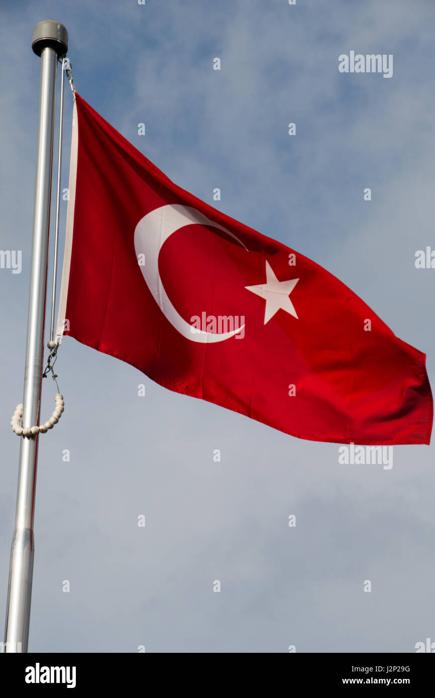 Turkish national flag hang on a pole in open air Stock Photo - Alamy