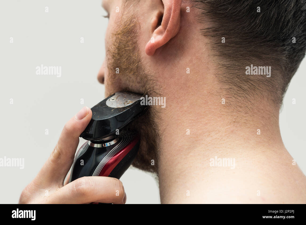 Cutting off hair hi-res stock photography and images - Alamy