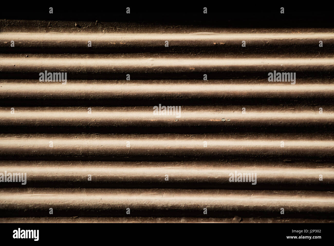 Straight lines on a shop front shutter as a metal background Stock ...