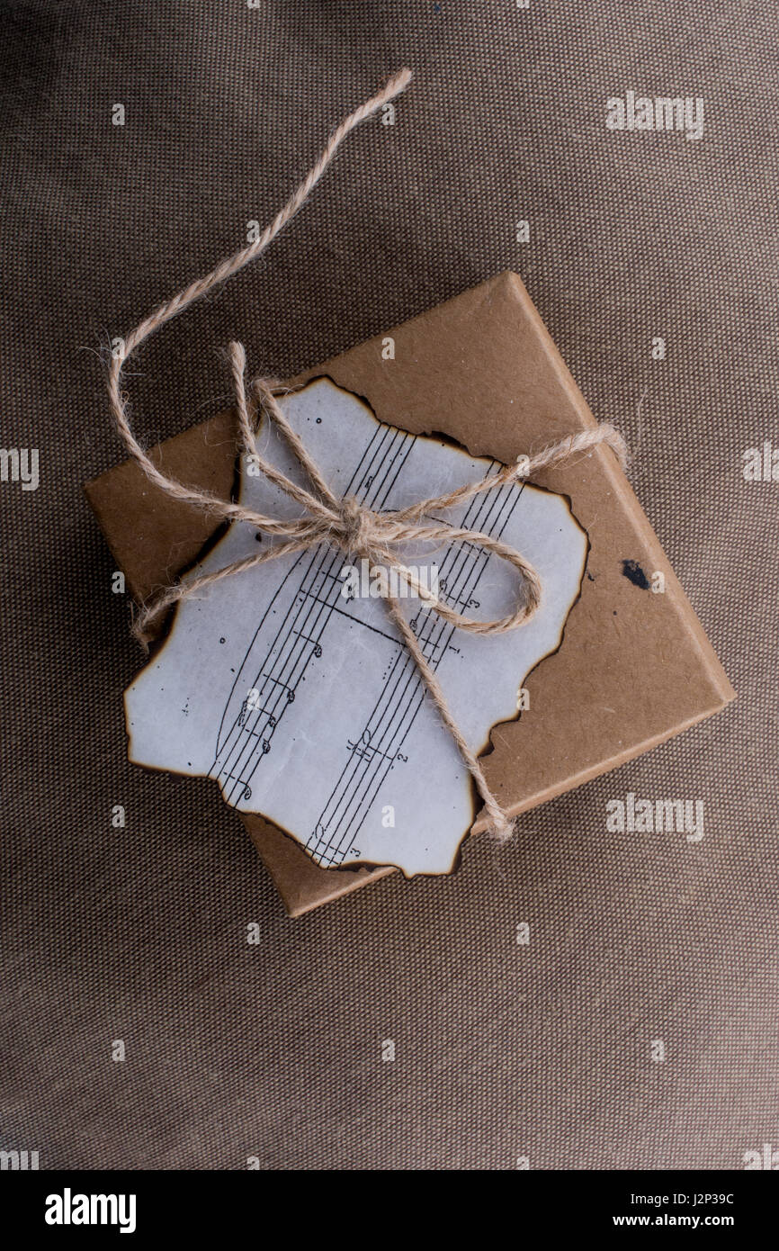 Musical notes on a burnt paper on a brown background Stock Photo - Alamy