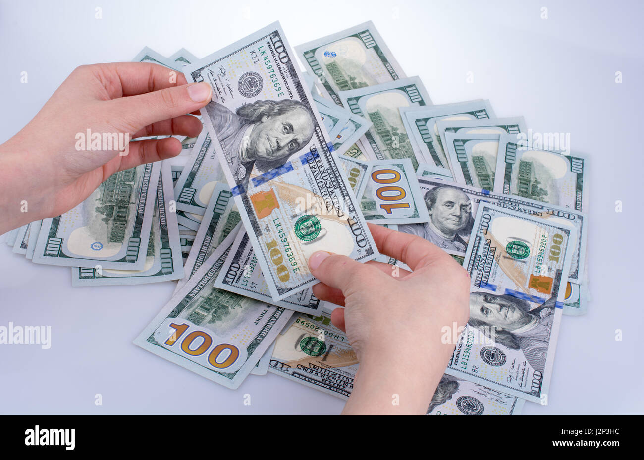 Human hand holding American dollar bill as money isolated on white ...