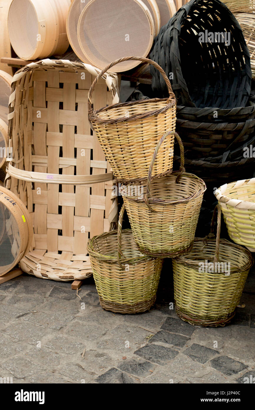 Empty wicker baskets are for sale in a market place Stock Photo - Alamy