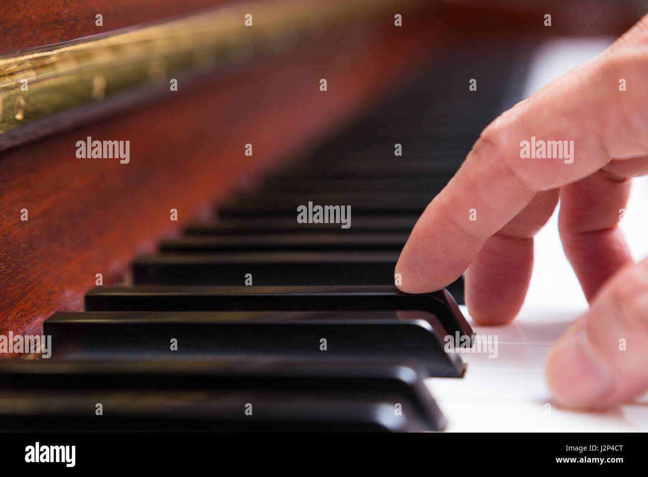 Finger on piano hi-res stock photography and images - Alamy