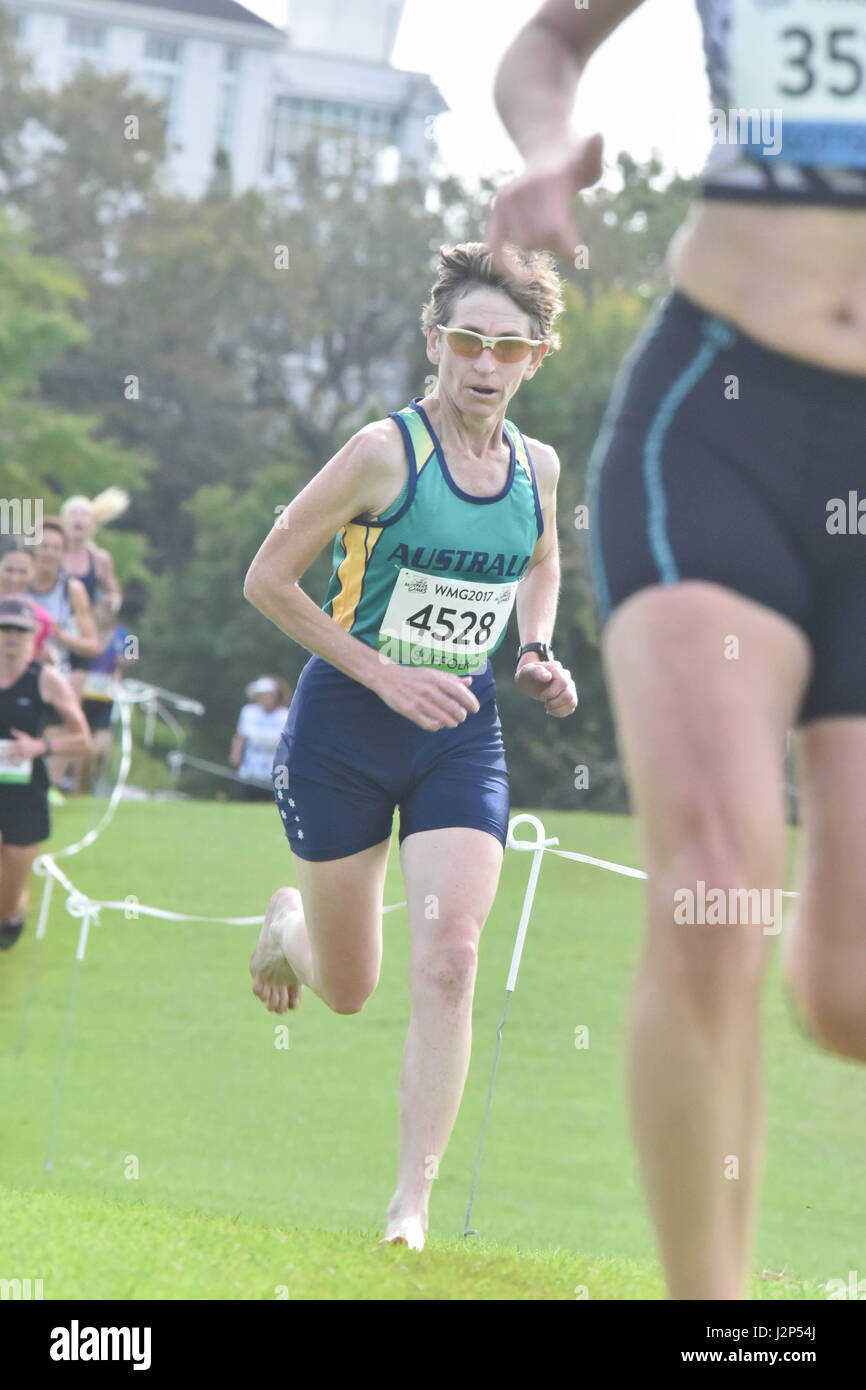 Auckland, New Zealand. 30th Apr, 2017. A participant runs with barefoot ...