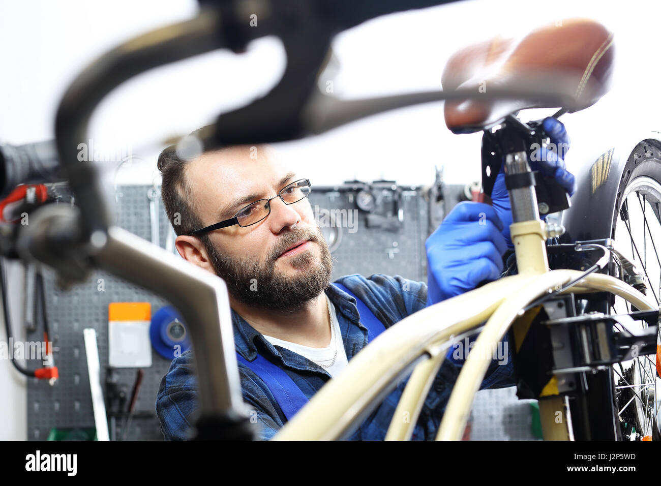 Bike service. Preparing your bike for the cycling season. Cleaning the ...