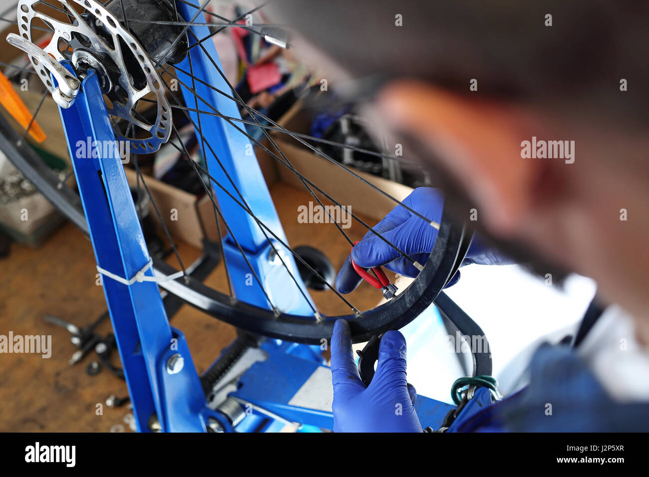 Centering wheels on a bike Stock Photo - Alamy