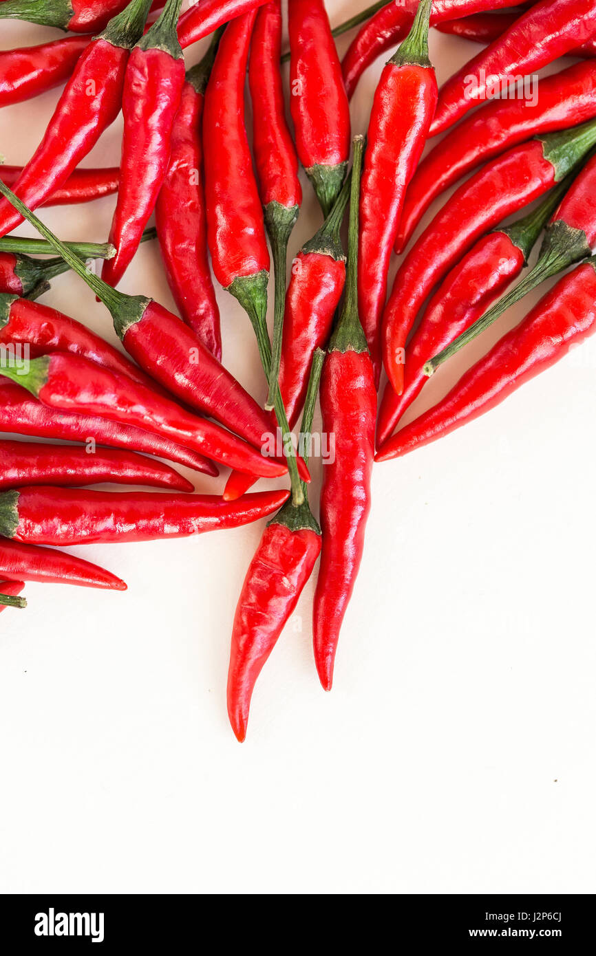 red hot chili peppers, popular spices concept - beautiful handful of ...