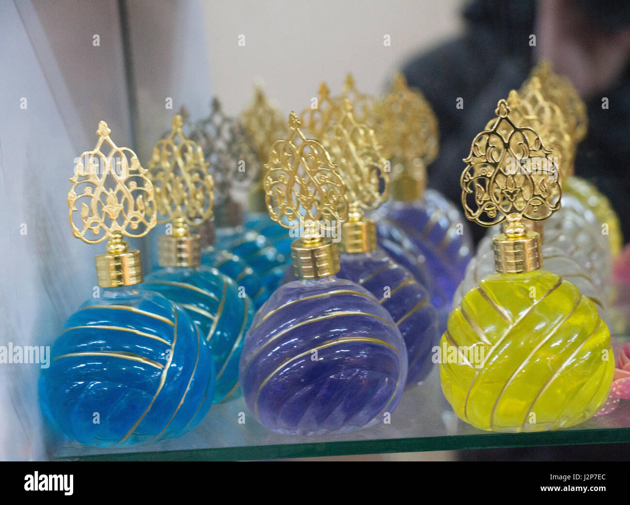 Set of Empty small transparent color bottles Stock Photo - Alamy