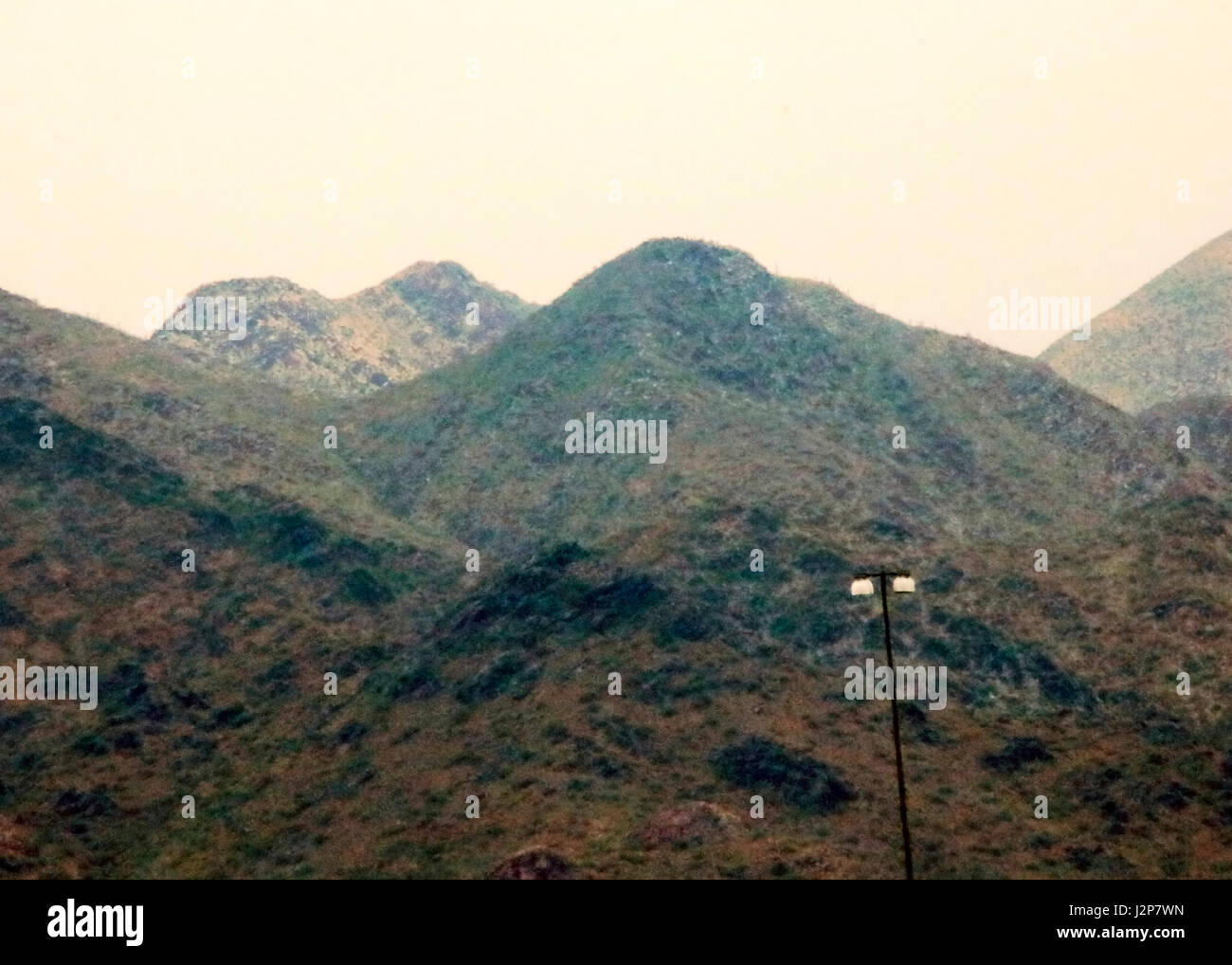 A mountain view that covers many hills and layer in vivid colors Stock ...