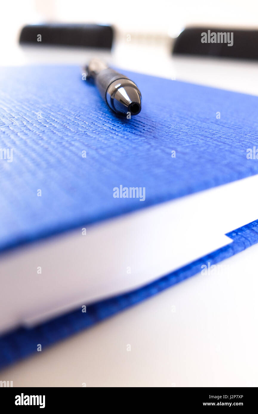 Blue table notebook hi-res stock photography and images - Alamy