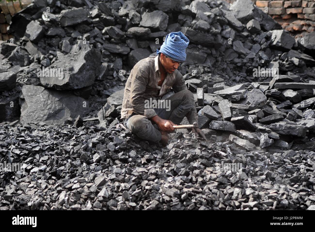 Indian labors working at a brick factory on the eve of International ...