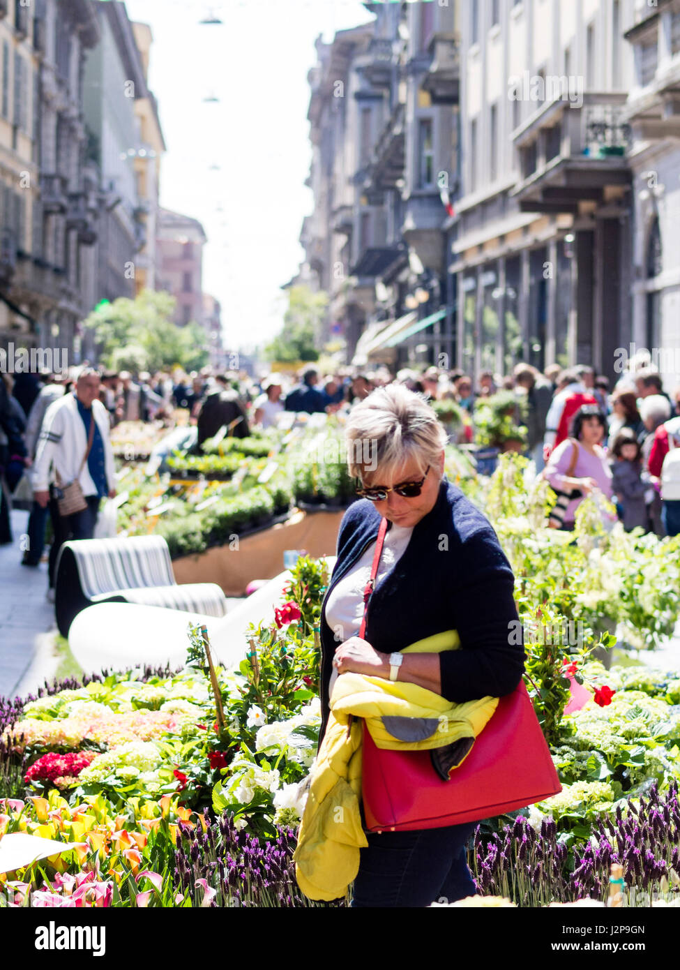 Crowded Botanic Invasions event - street flower and plants open market ...