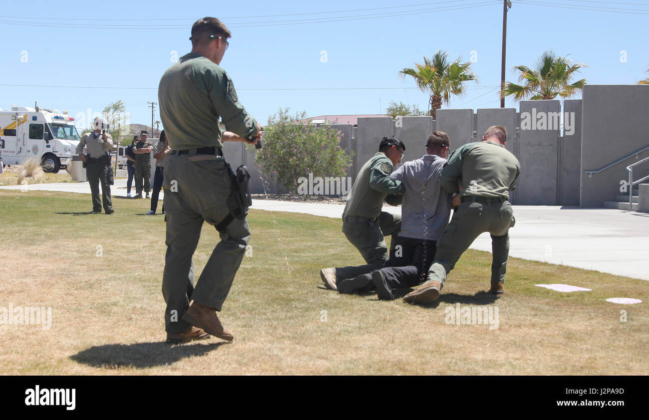 Special Reaction Team members, Provost Marshals Office, subdue Agent ...