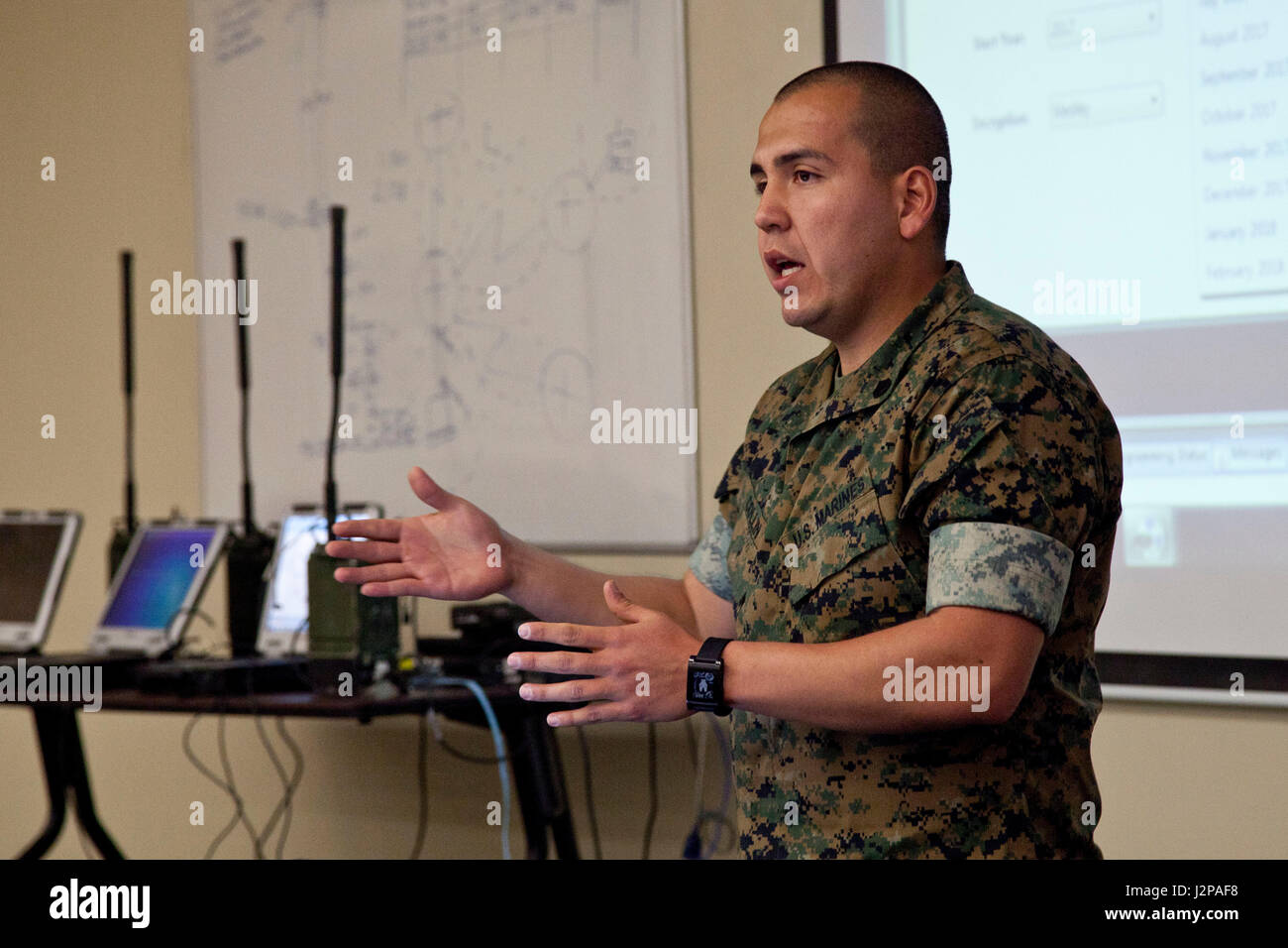 A U.S. Marine instructor assigned to the Basic Communications Officer ...