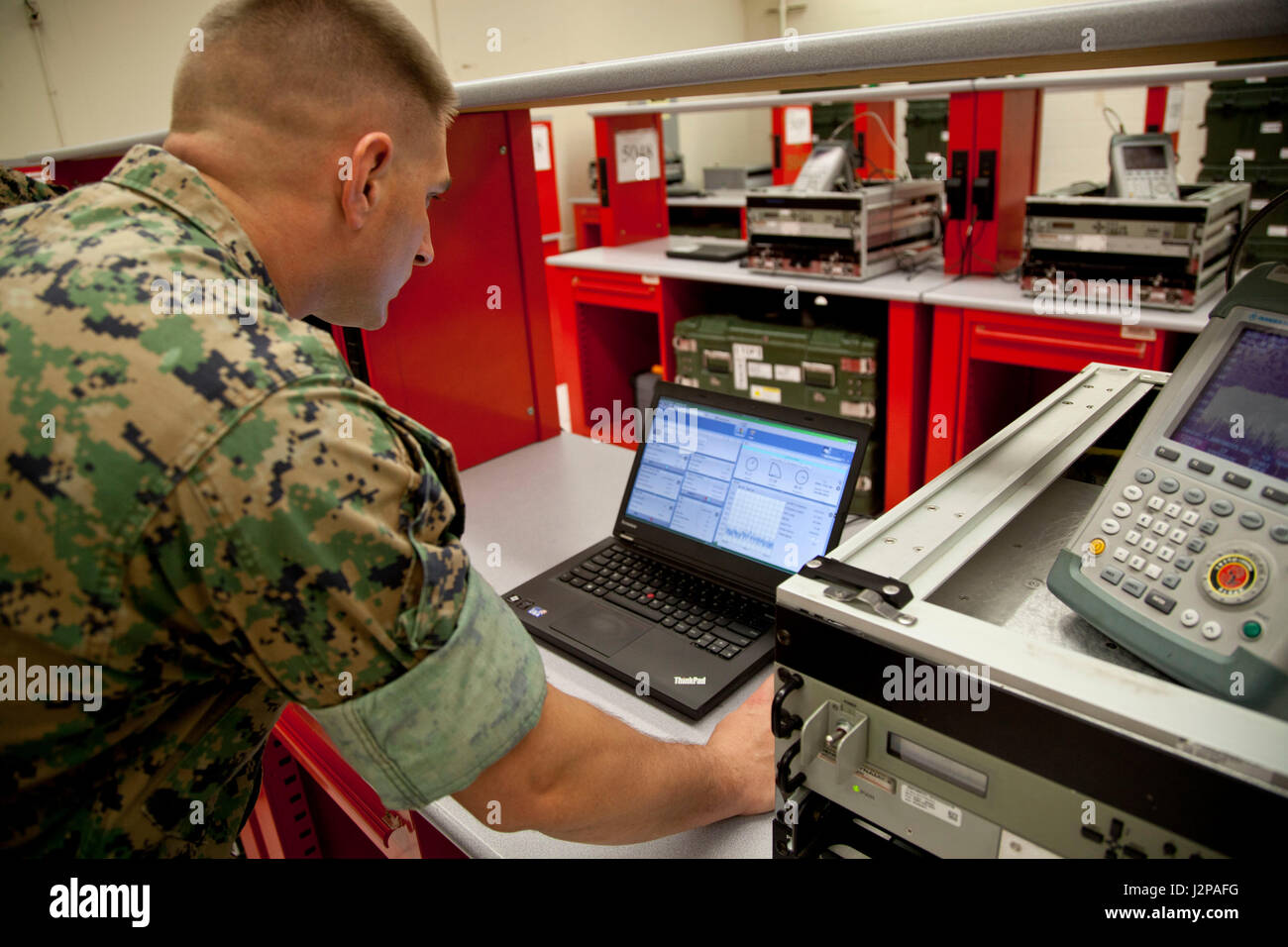 A U.S. Marines assigned to the Electronics Maintenance Techinicians ...