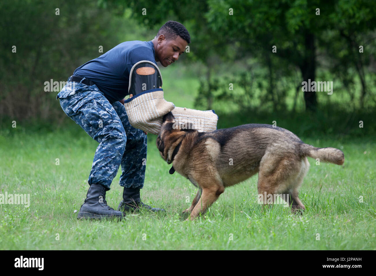 U.S. Navy Petty Officer 3rd Class Donnovon G. Angevine, assigned to the ...