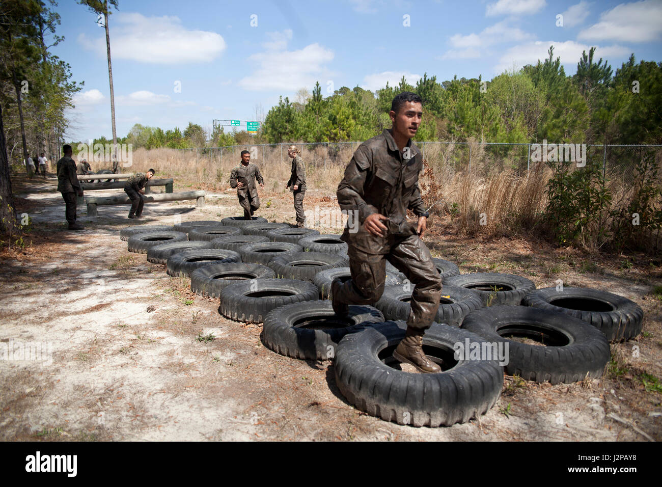 Marines from Ground Supply School perform obstacles, buddy drags, and ...