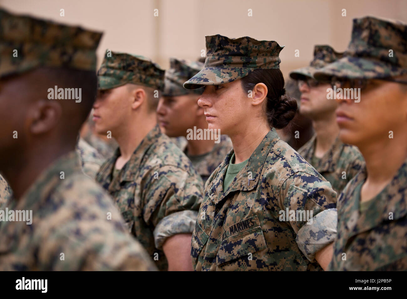 U.S. Marine Corps Pfc. Natalie Price, center, assigned to Charlie ...