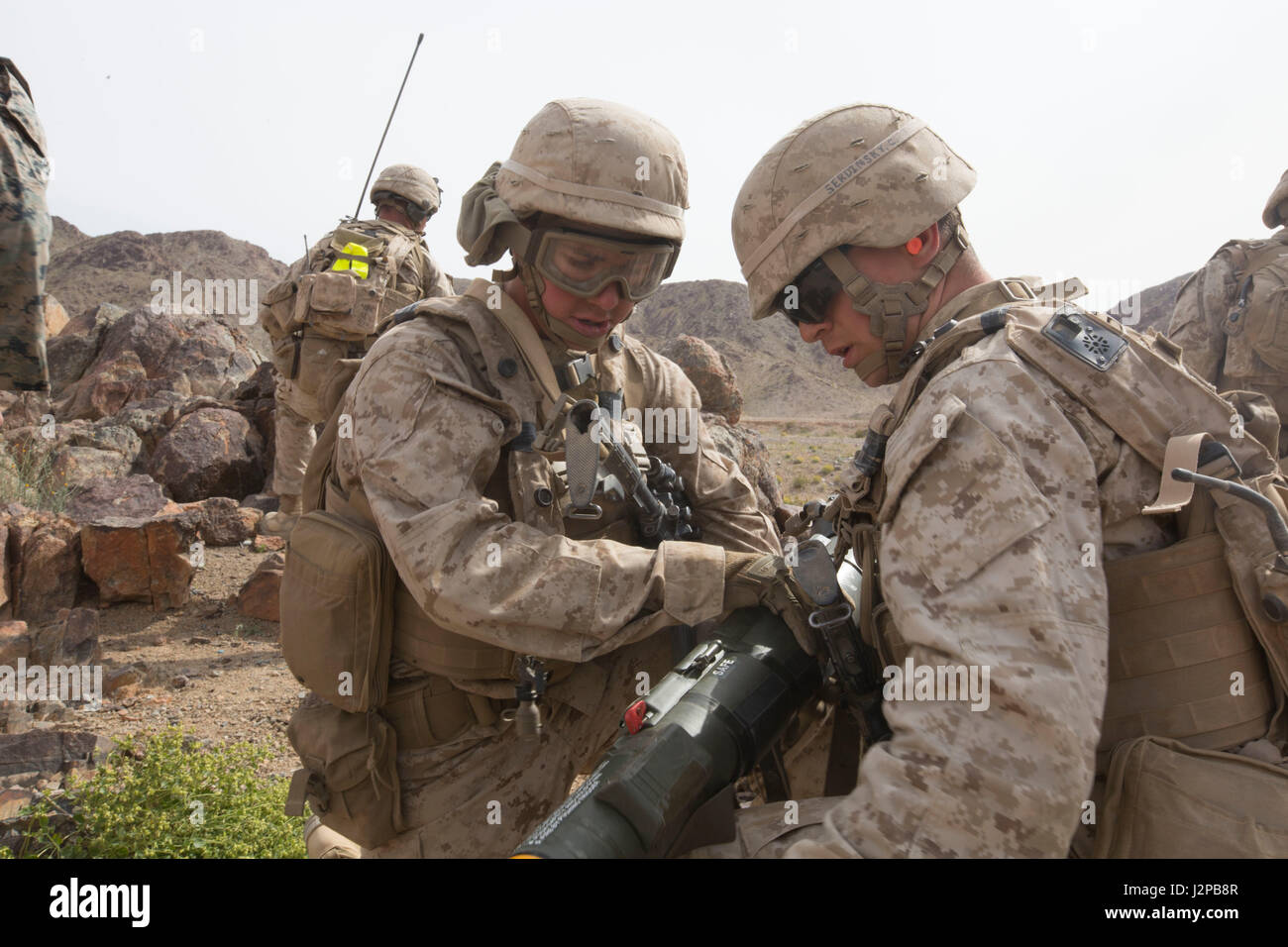U.S. Marine Corps Pfc. Cody E. Wells, left, an assaultman with Golf ...