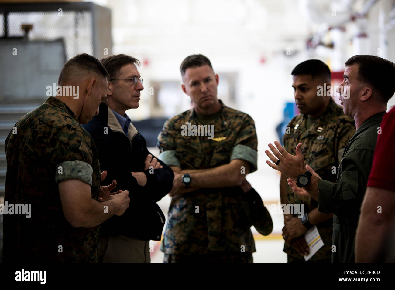Secretary of the Navy Sean Stackley speaks with Lt. Col. Scott Trent ...