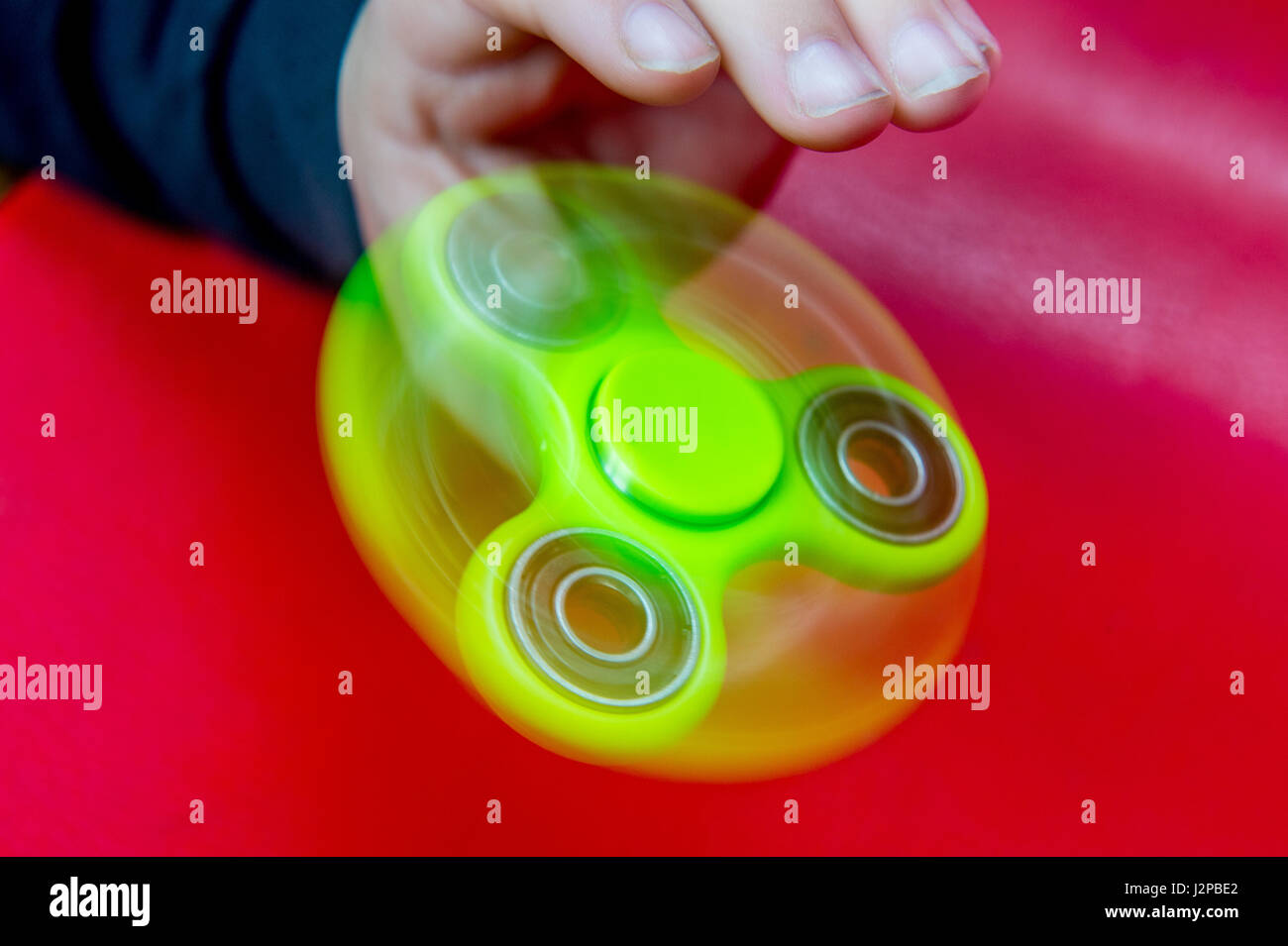 Sunday 30 April 2014 Pictured: Bright Green fidget spinner in use over ...