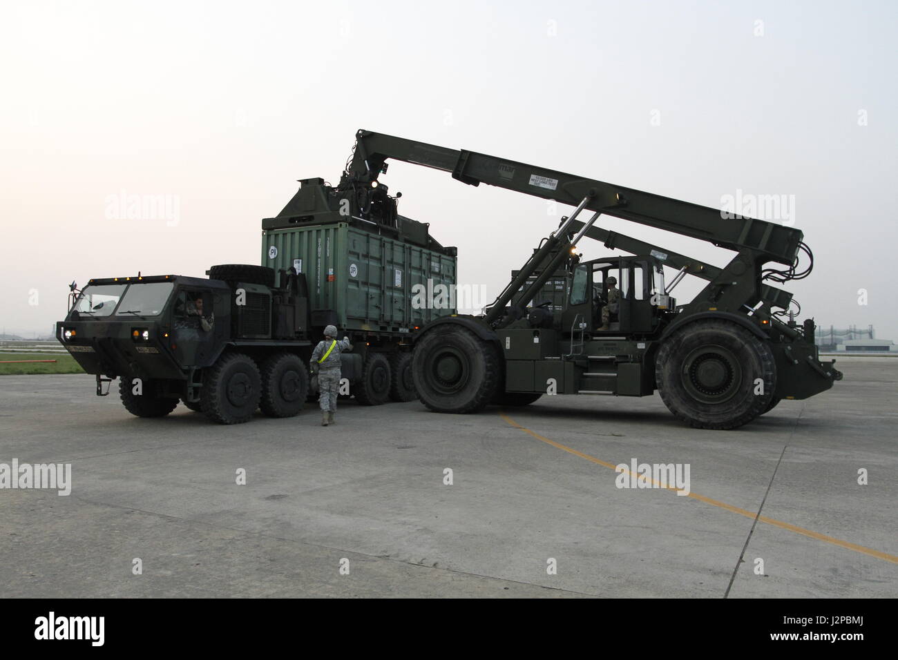 Service members conduct combined joint logistics over the shore ...
