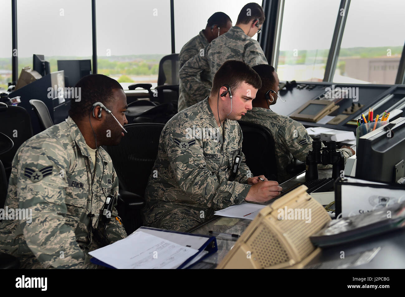 Members of the 1st Operations Support Squadron air traffic control ...