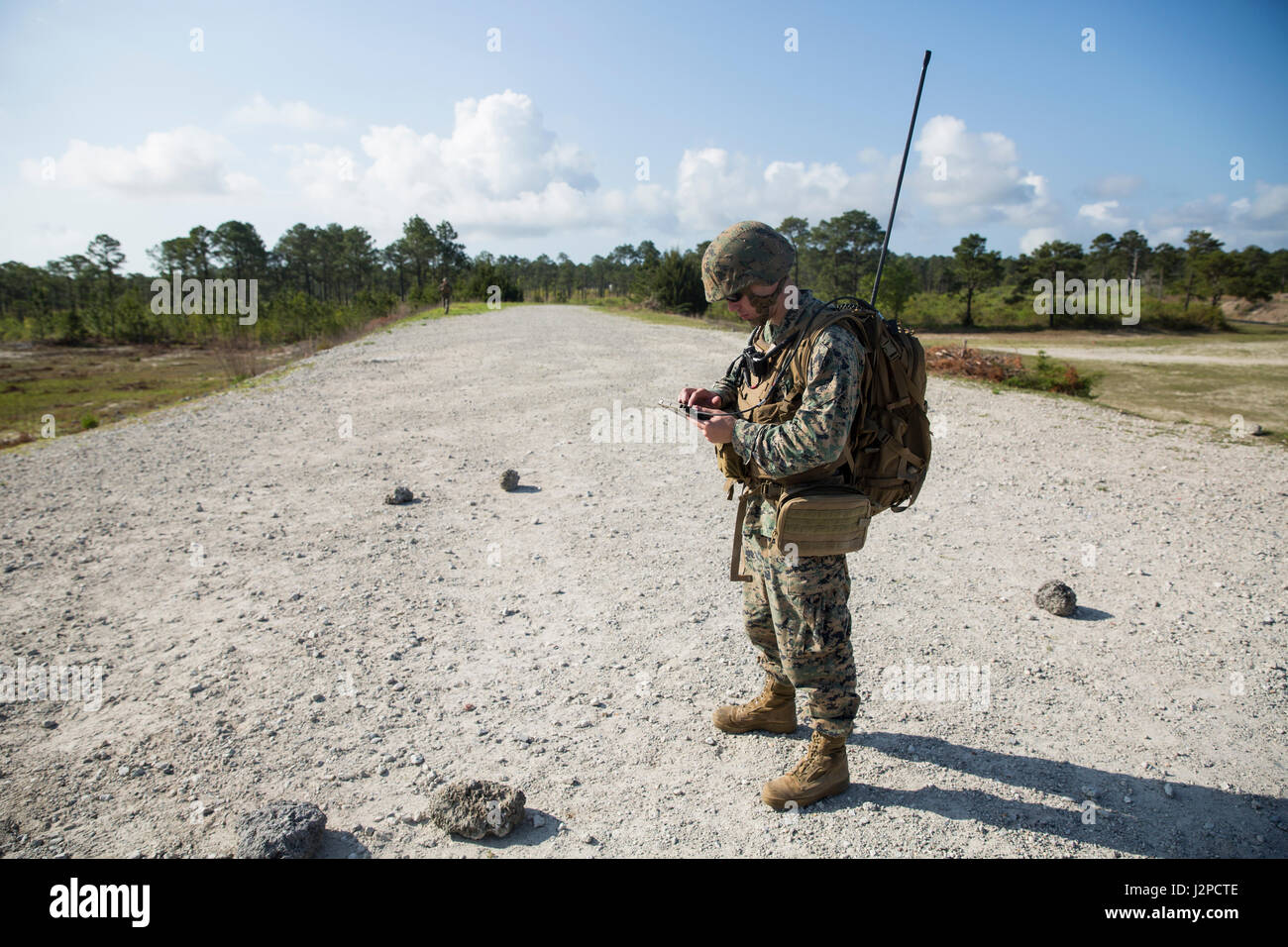 A Marine coordinates a fire mission with a Target Handoff System v2.0 ...
