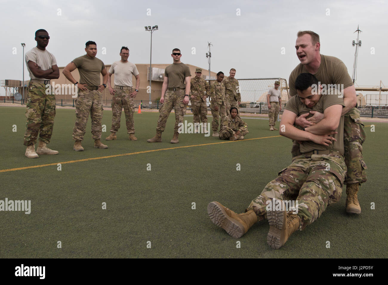 Sgt. Anthony Milam, with U.S. Army Central, demonstrates the use of the ...