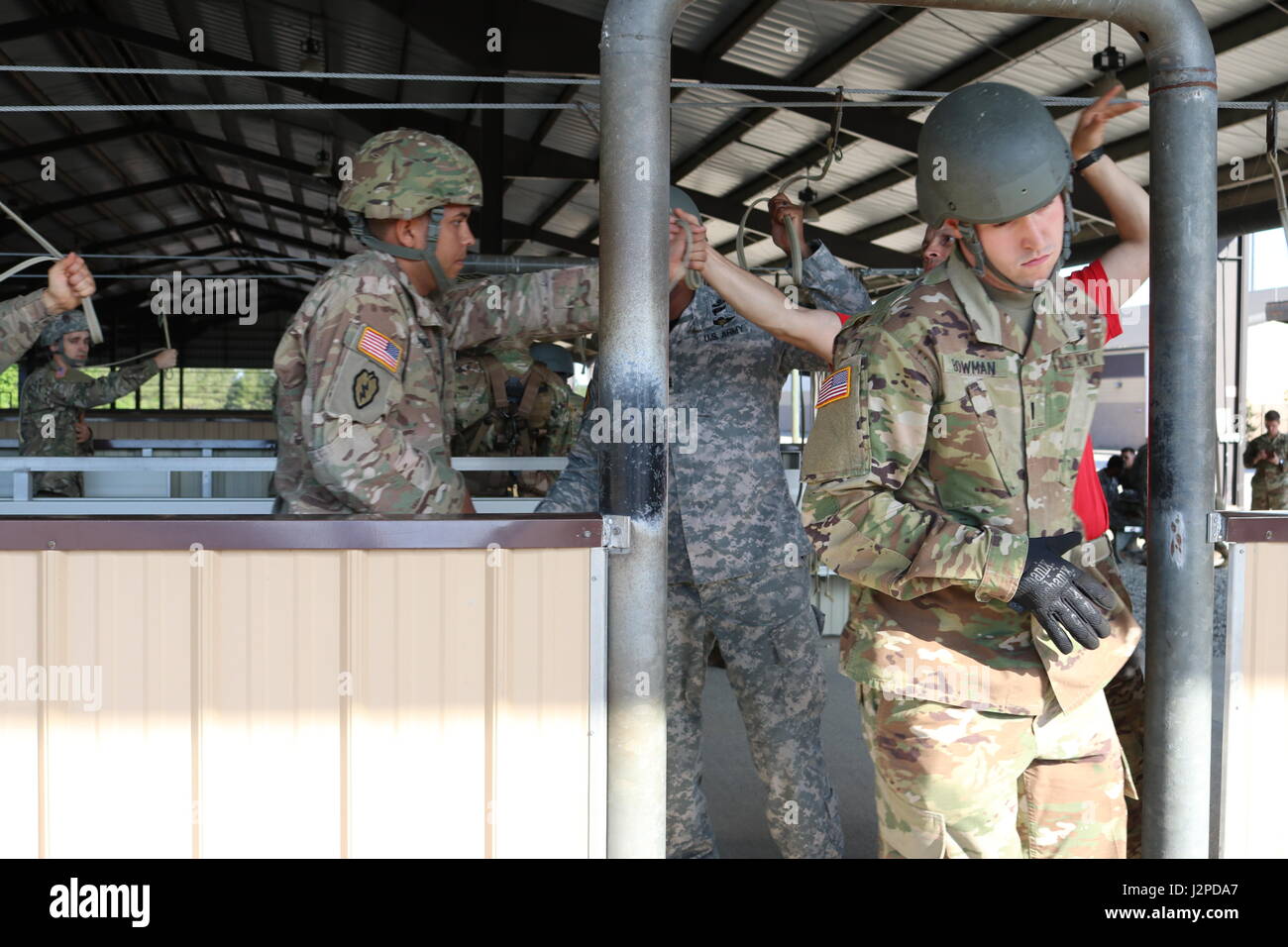 U.S. Army 1st Lt. Richard Bowman, right, a U.S. Soldier assigned to the ...