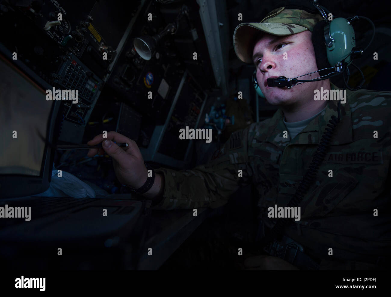 A boom operator, assigned to the 340th Expeditionary Air Refueling ...