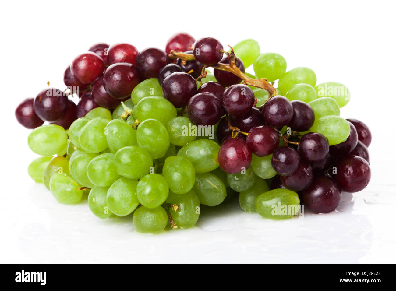 fresh rose and green grapes Stock Photo - Alamy