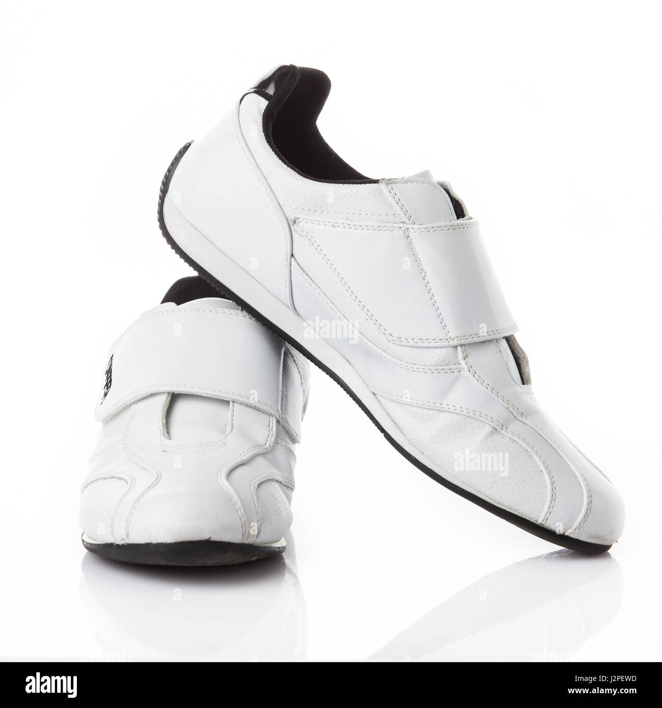 White Sport shoes isolated on white Stock Photo - Alamy