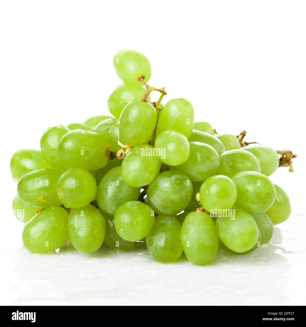 Fresh green grapes on white background Stock Photo - Alamy