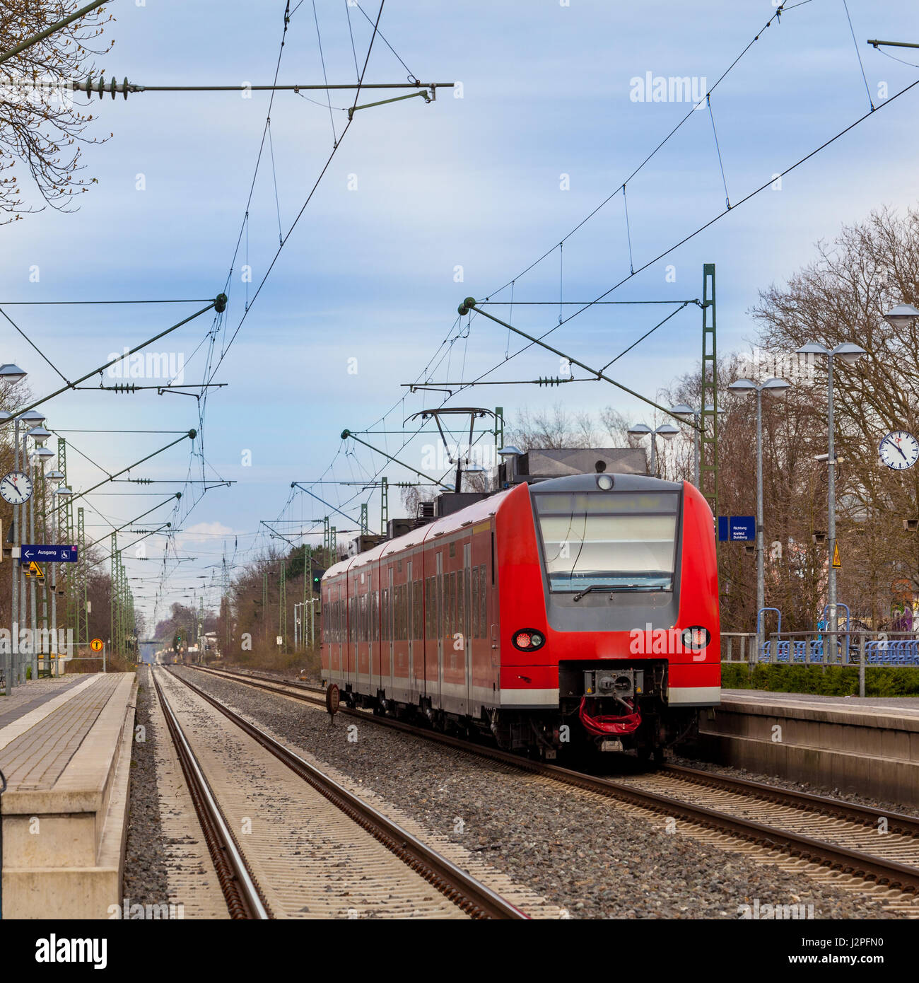 Modern train at the station. train on tracks Stock Photo - Alamy