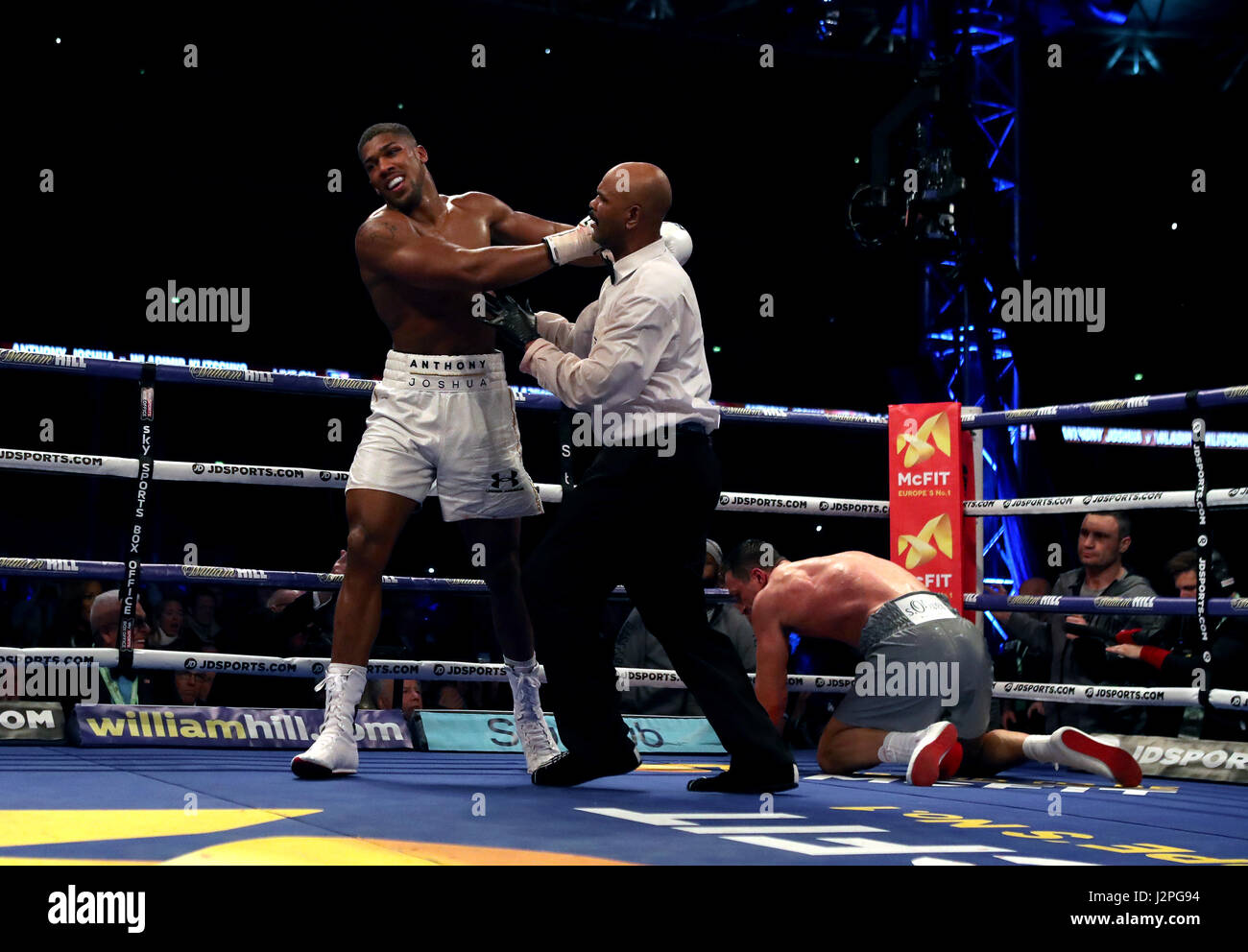 Referee David Fields gets between Wladimir Klitschko and Anthony Joshua ...