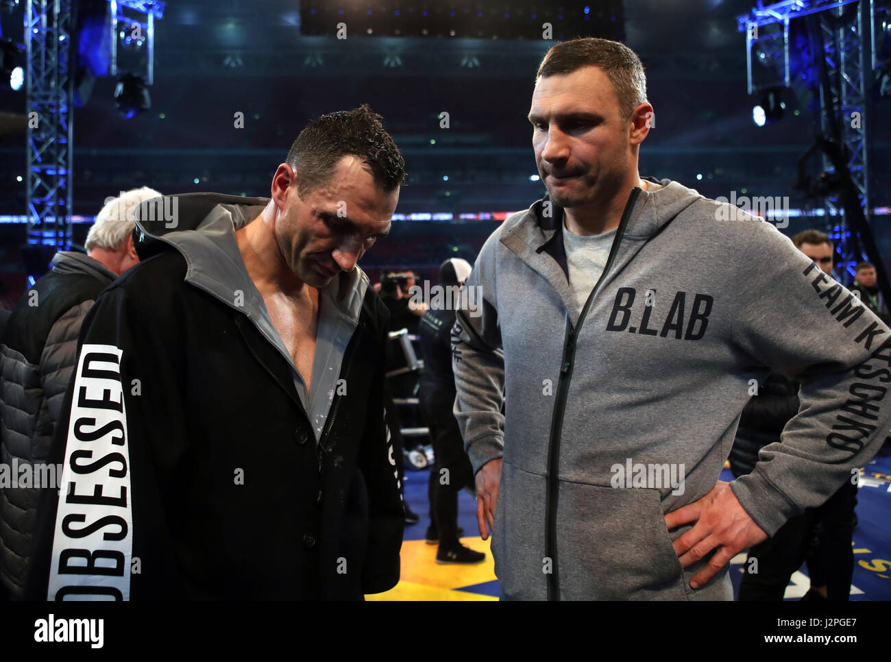 Wladimir Klitschko's with his brother Vitali (right) following defeat ...